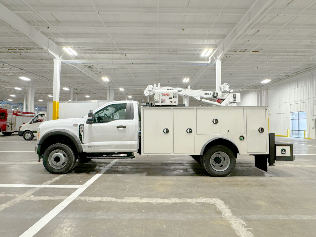 Ford F-600 with Warner 8k Crane Body & Liftmoore 8045 Crane - Smyrna Truck